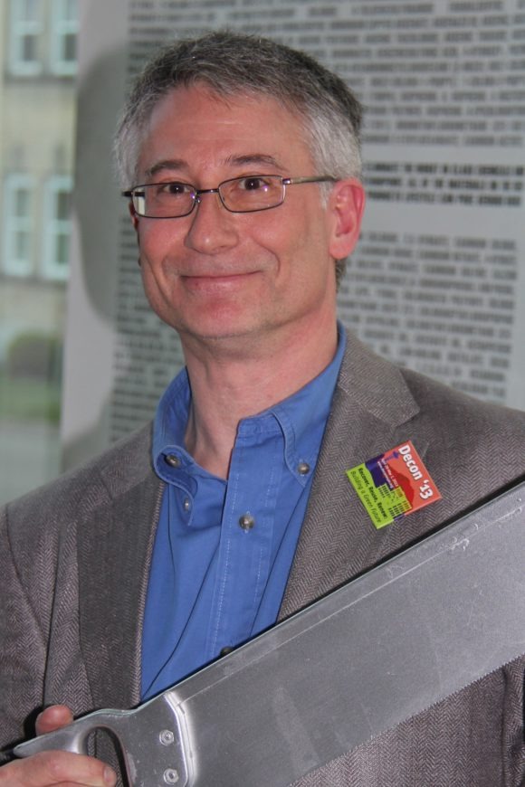 Jim with Silver Saw (2) - Leaders In Energy